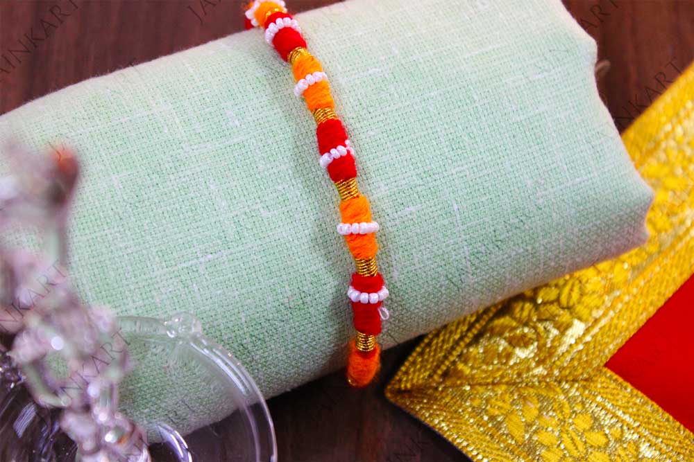 Orange Raksha Potli With Golden Dhaga - Buy Jain Raksha Potli With ...